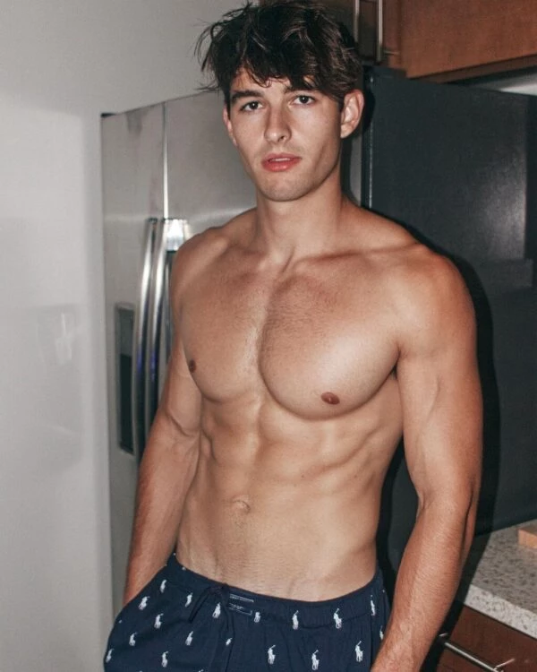 A Visual Delight: Darrell Jones Mesmerizes in Striking Fitness Model Photos - The Pink Times